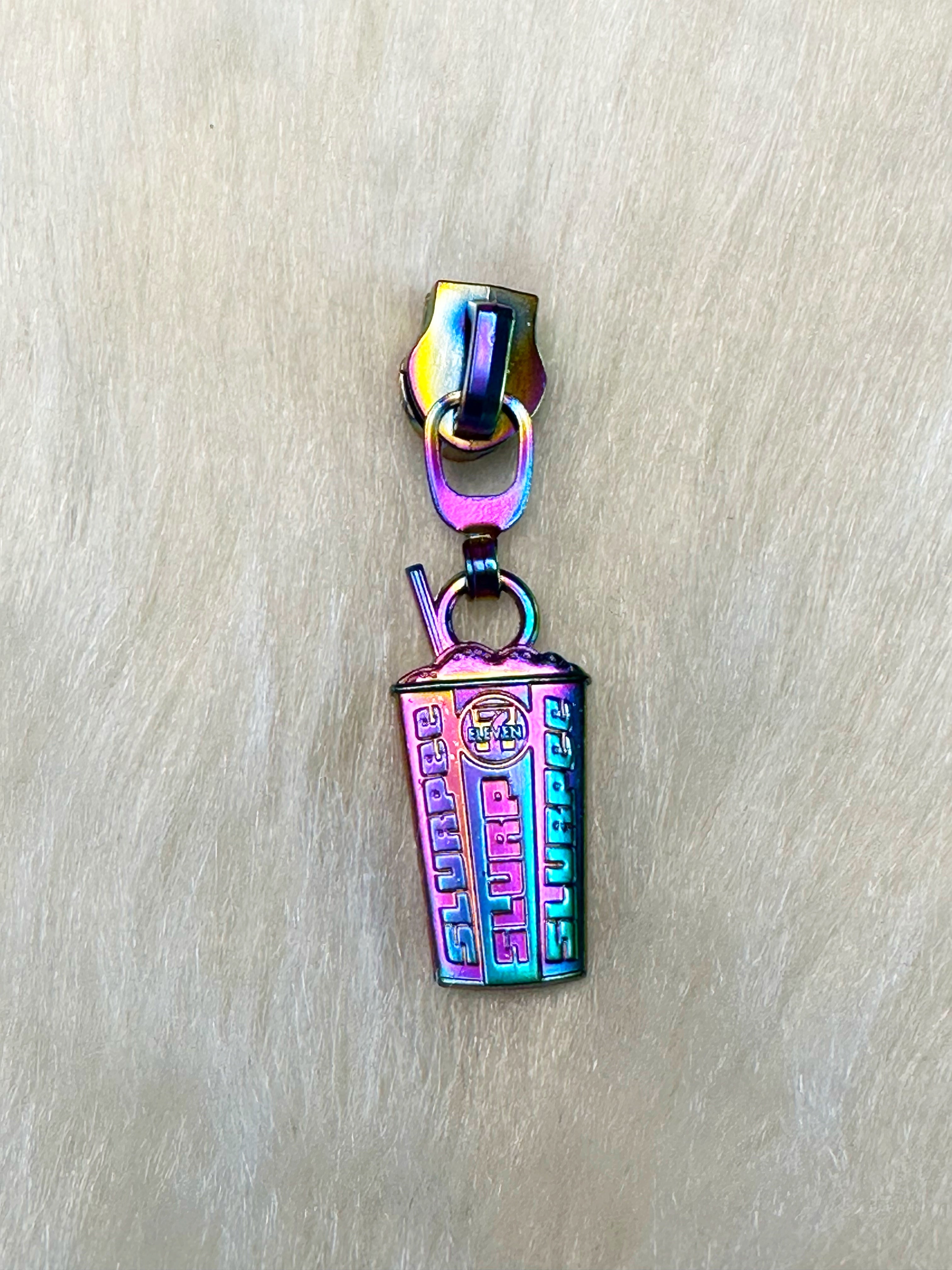 Slurpee Zipper Pull (Rainbow Finish) – RAW DESIGNS CCTX